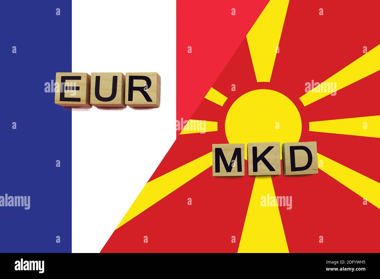 France and Macedonia currencies codes on national flags background ...