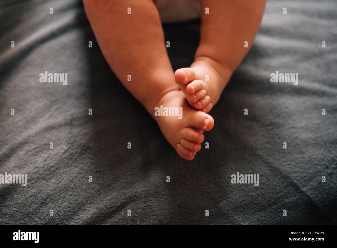 small and cute baby legs Stock Photo - Alamy