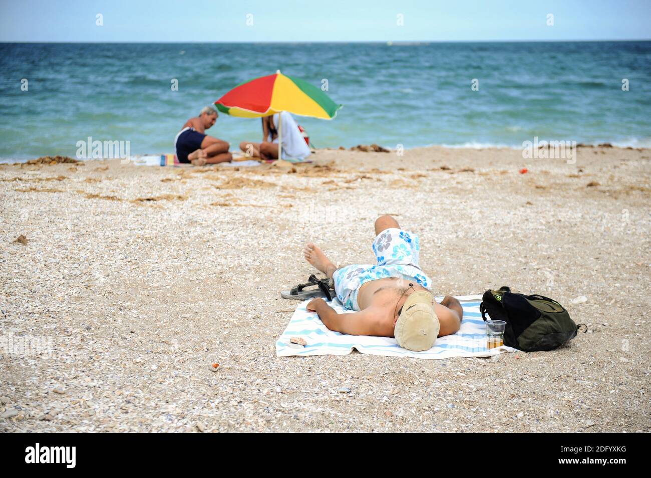 Vama Veche, Romania - June 29, 2012: People enjoy the sun and sand on a ...
