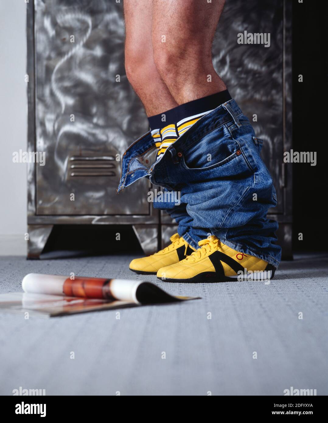 Man with his pants down Stock Photo - Alamy