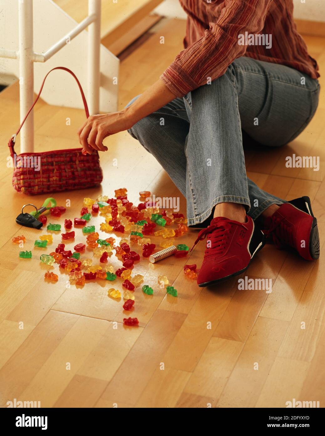 Female legs with rubber beers Stock Photo - Alamy