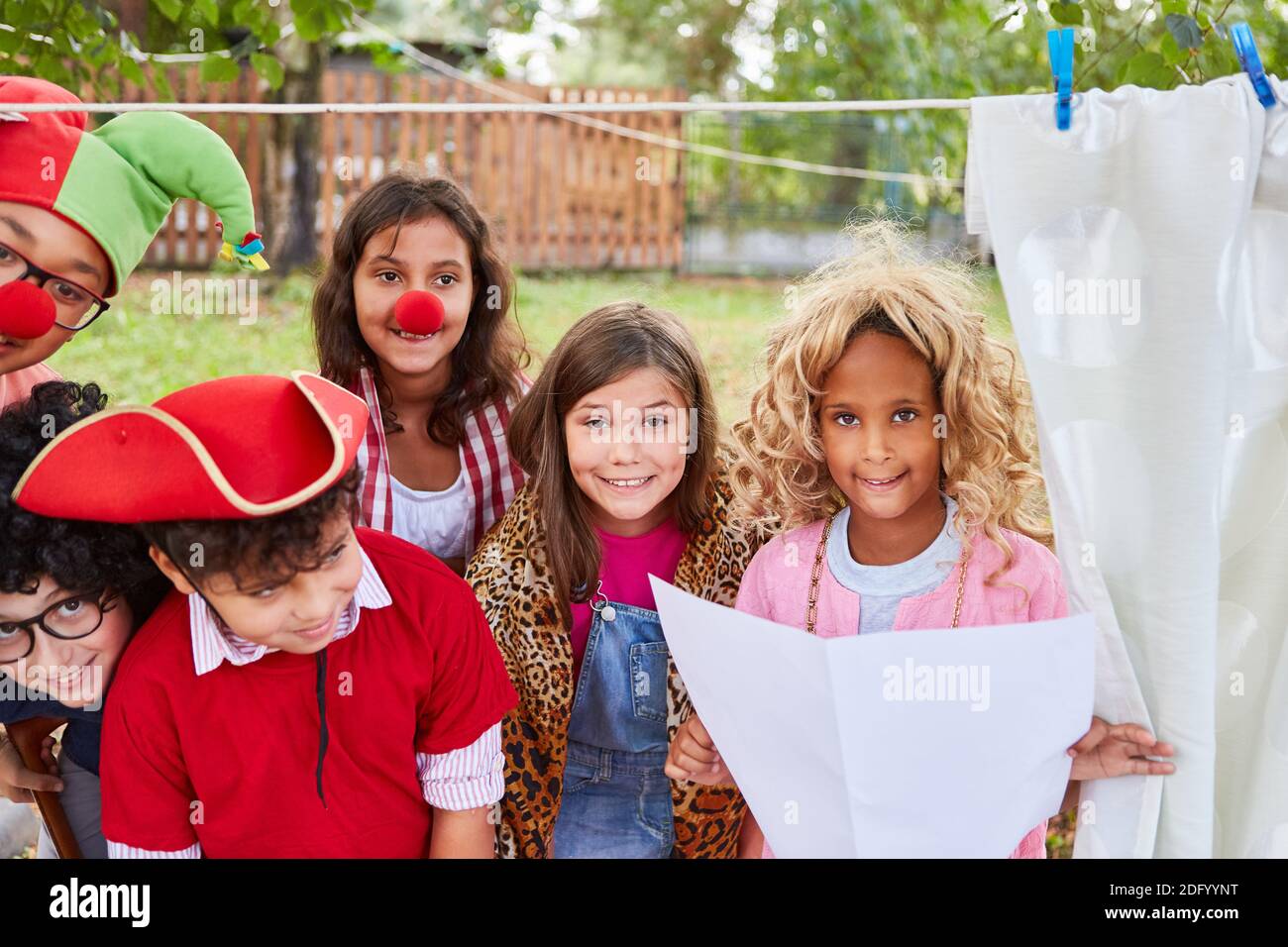 Children as a theater group in disguise in Carnival or Mardi Gras at ...