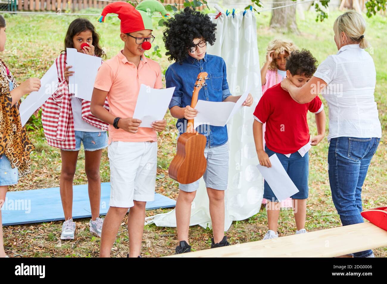 Group of children preparing for the talent show at the holiday camp ...
