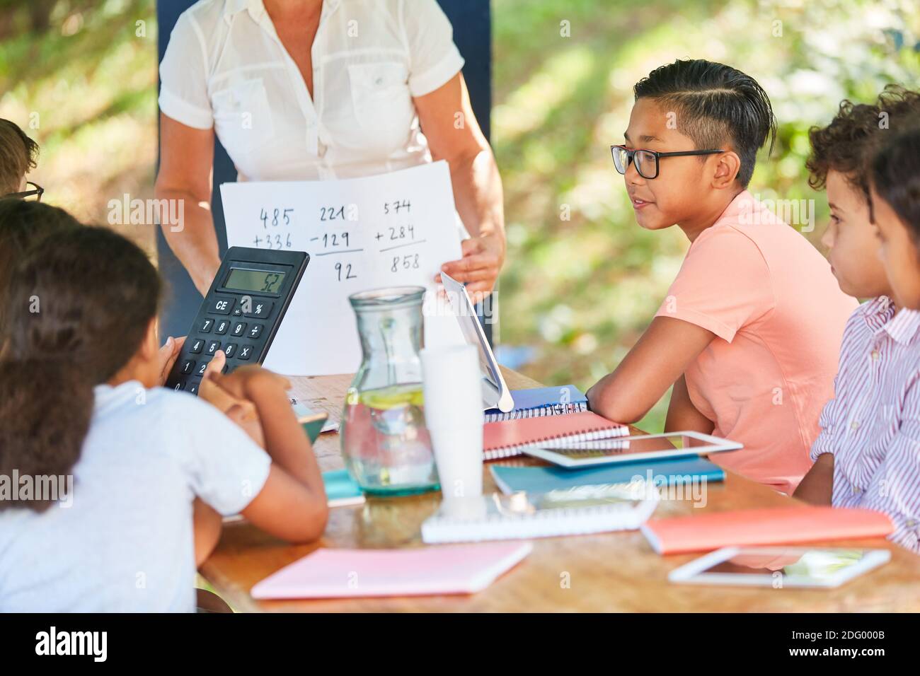 Children learn mathematics in the summer tuition summer course at the ...