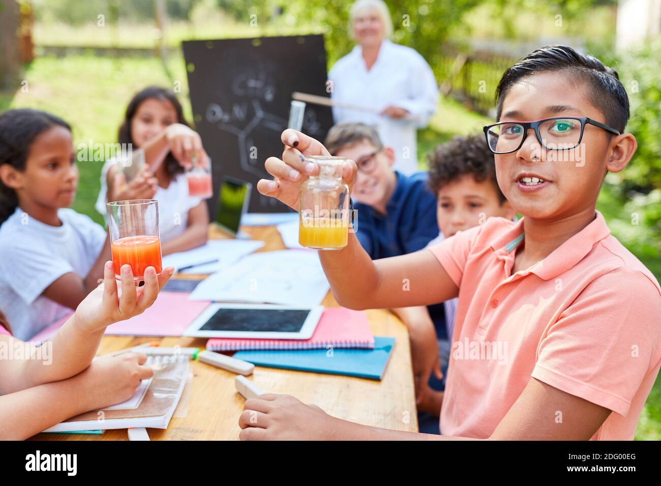 Children have fun doing chemistry experiments in the tutoring lessons ...