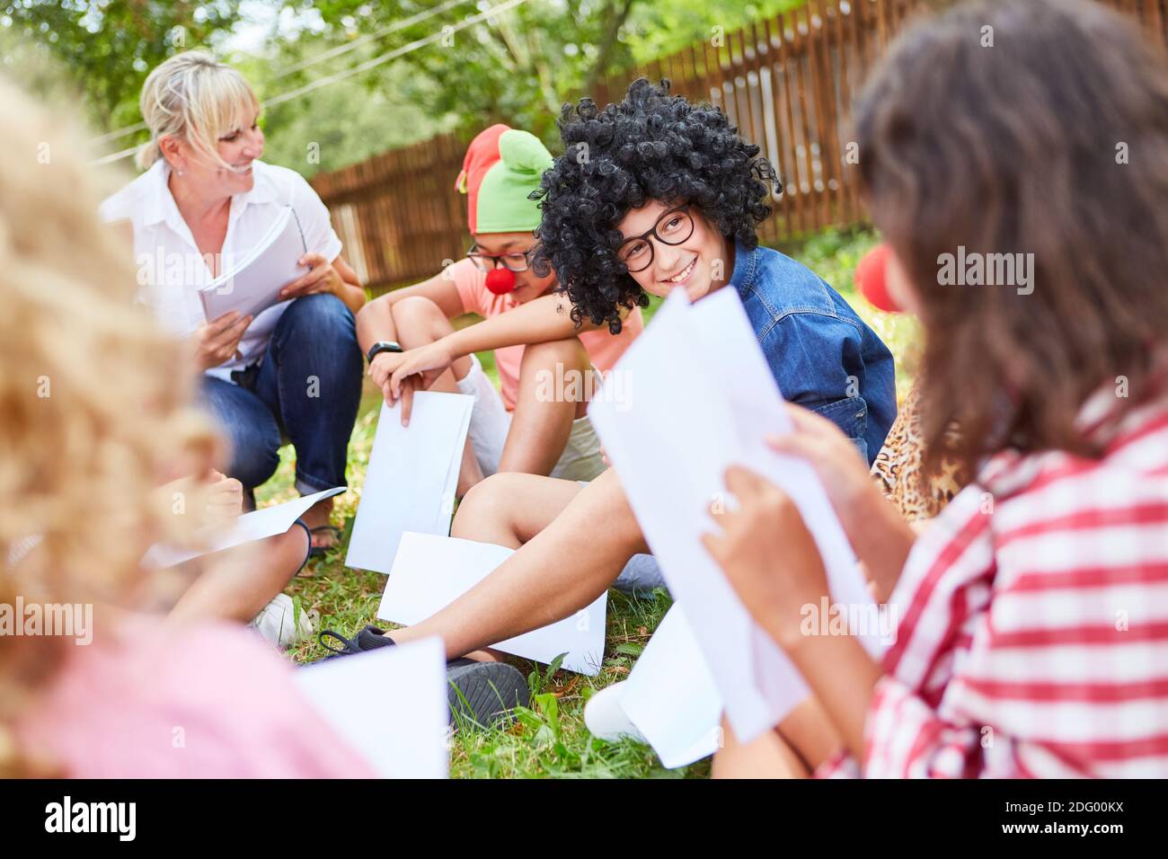 Group of children rehearsing a play or performance for the talent show ...