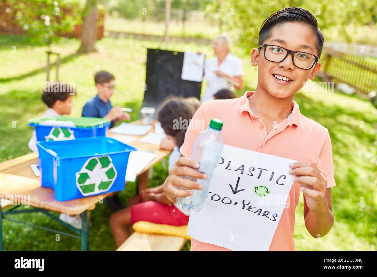 Child as an activist with plastic waste in the summer camp for ...