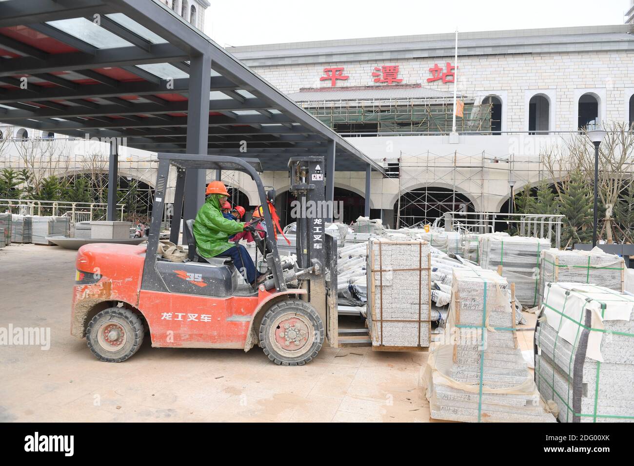 Fujian Province, China. 07th Dec, 2020. An employee of the China ...