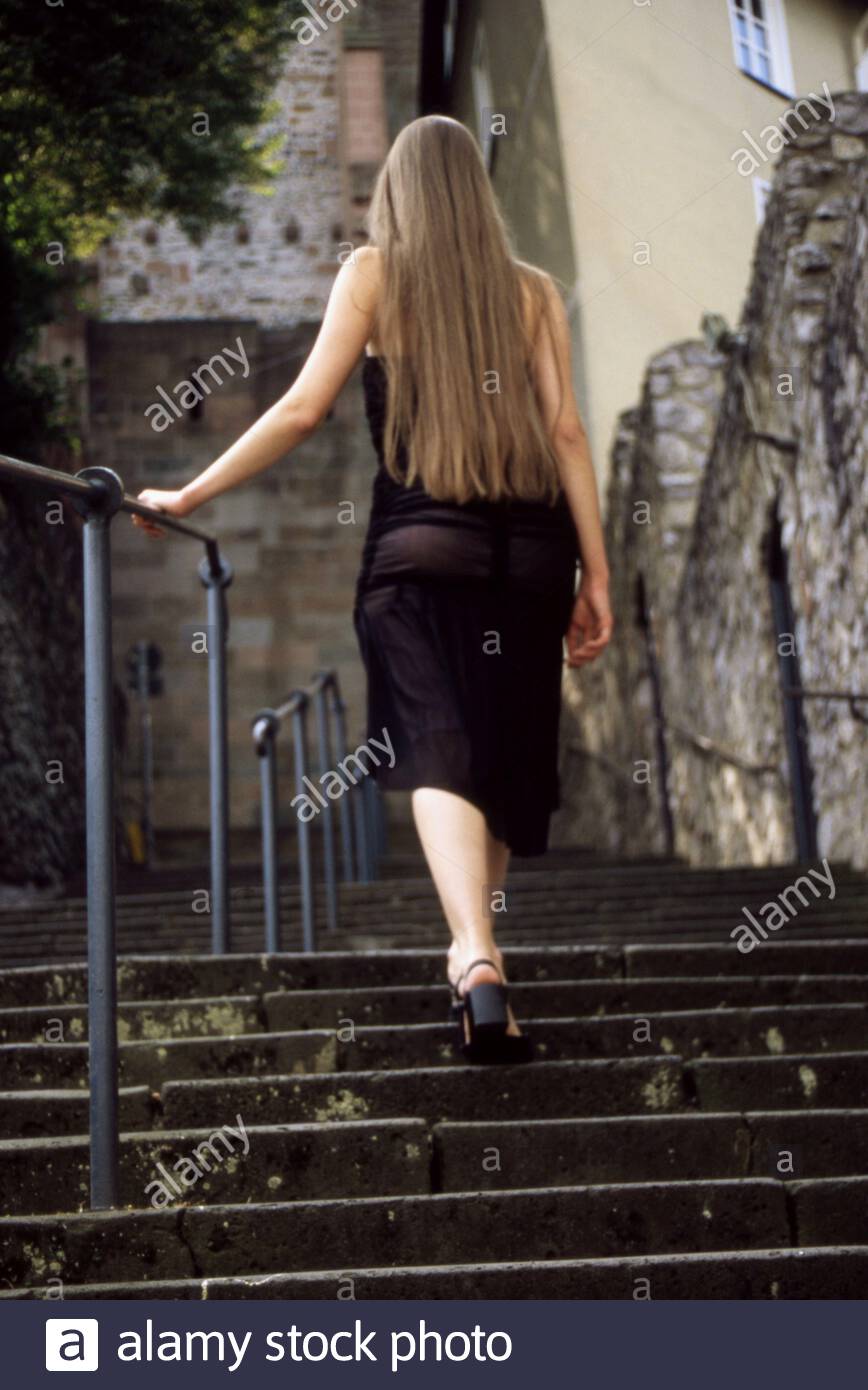 Girl Walking Up Stairs High Resolution Stock Photography and Images - Alamy