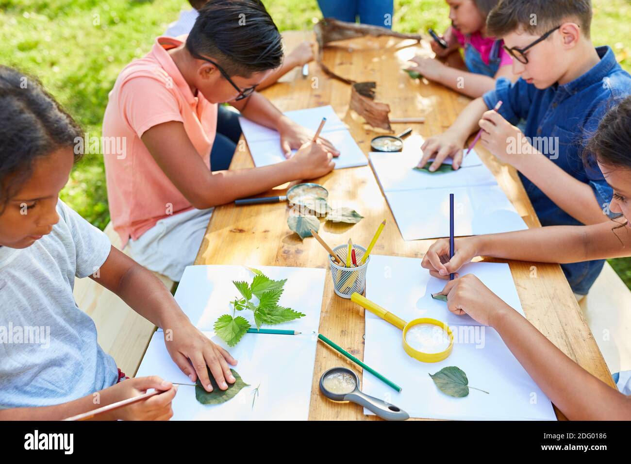 Children concentrate on drawing and doing handicrafts together at ...