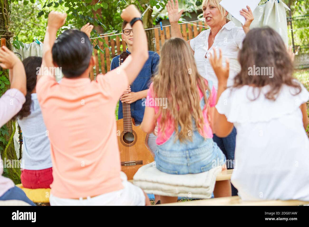 Cheering spectators after an appearance in the children's music talent ...