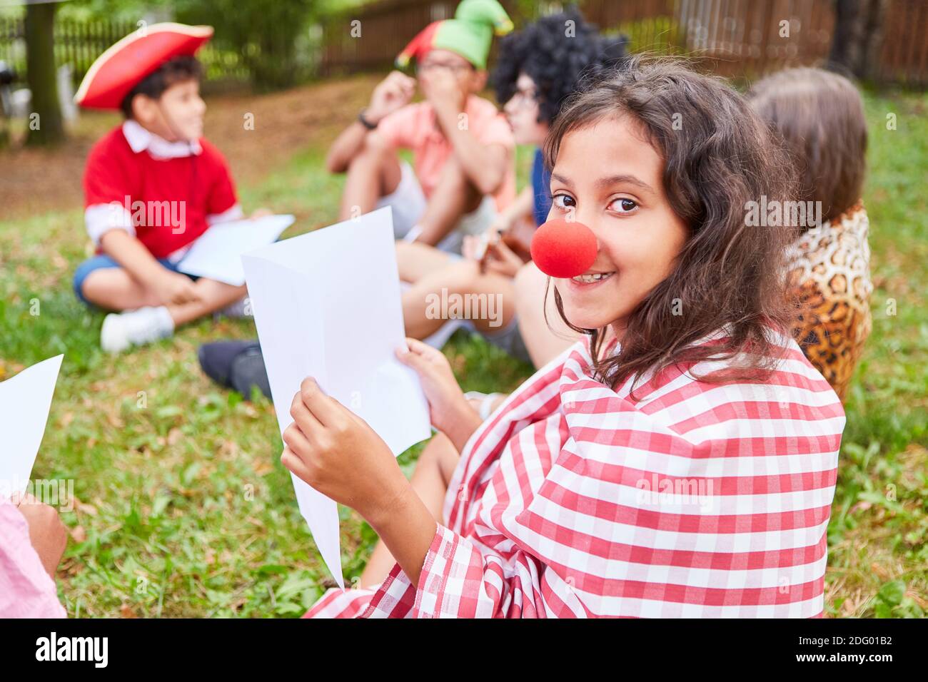 Children in funny disguise practice for appearing in the talent show at ...