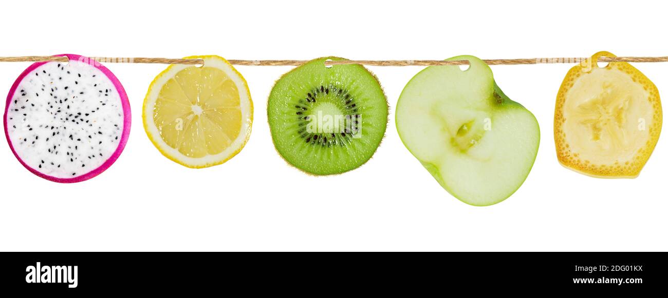 Concept photo of fruit hanging from a rope. Isolated white background ...