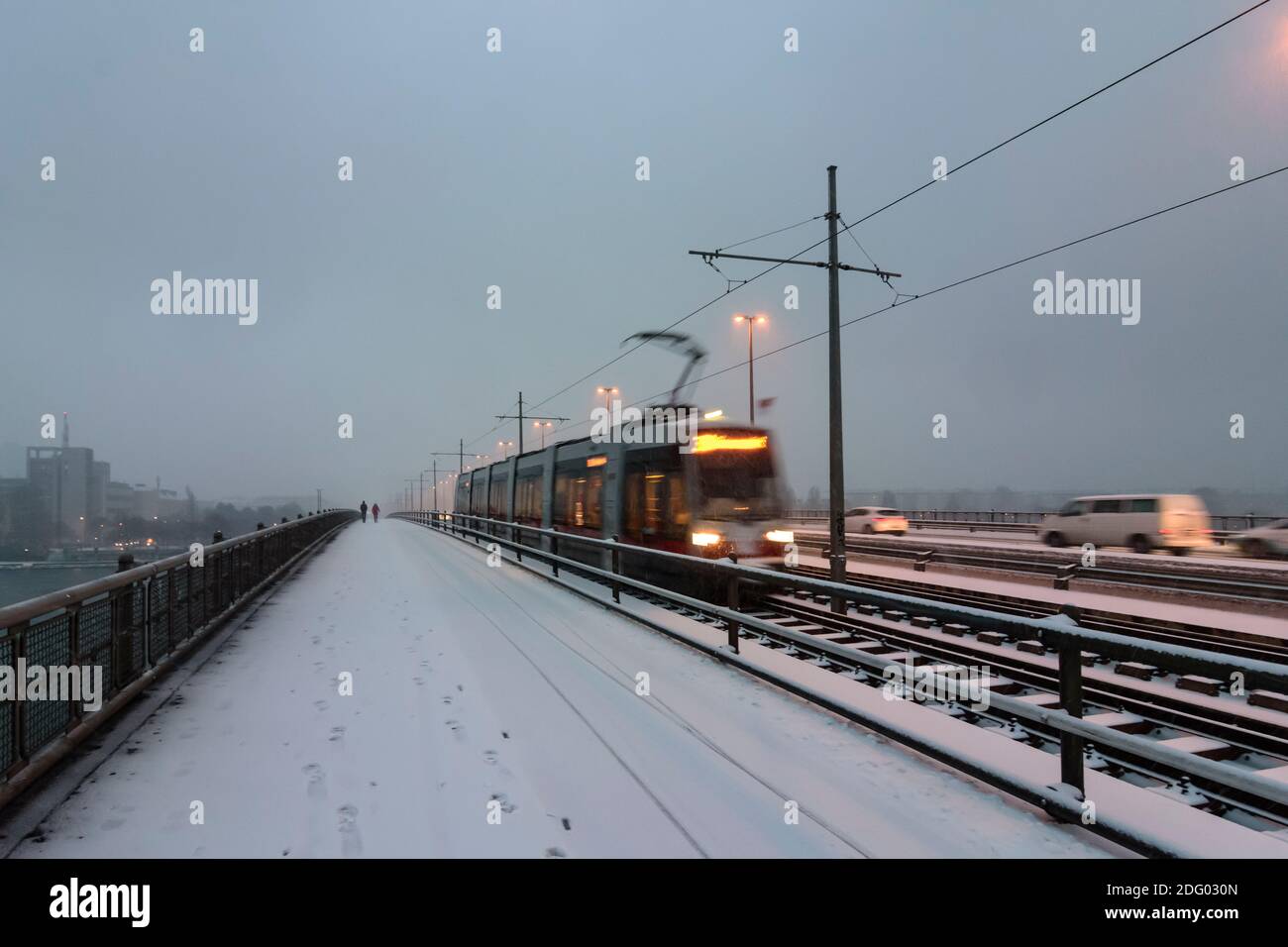 Wien, Vienna: bridge Floridsdorfer Brücke, snowfall, streetcar in 20 ...