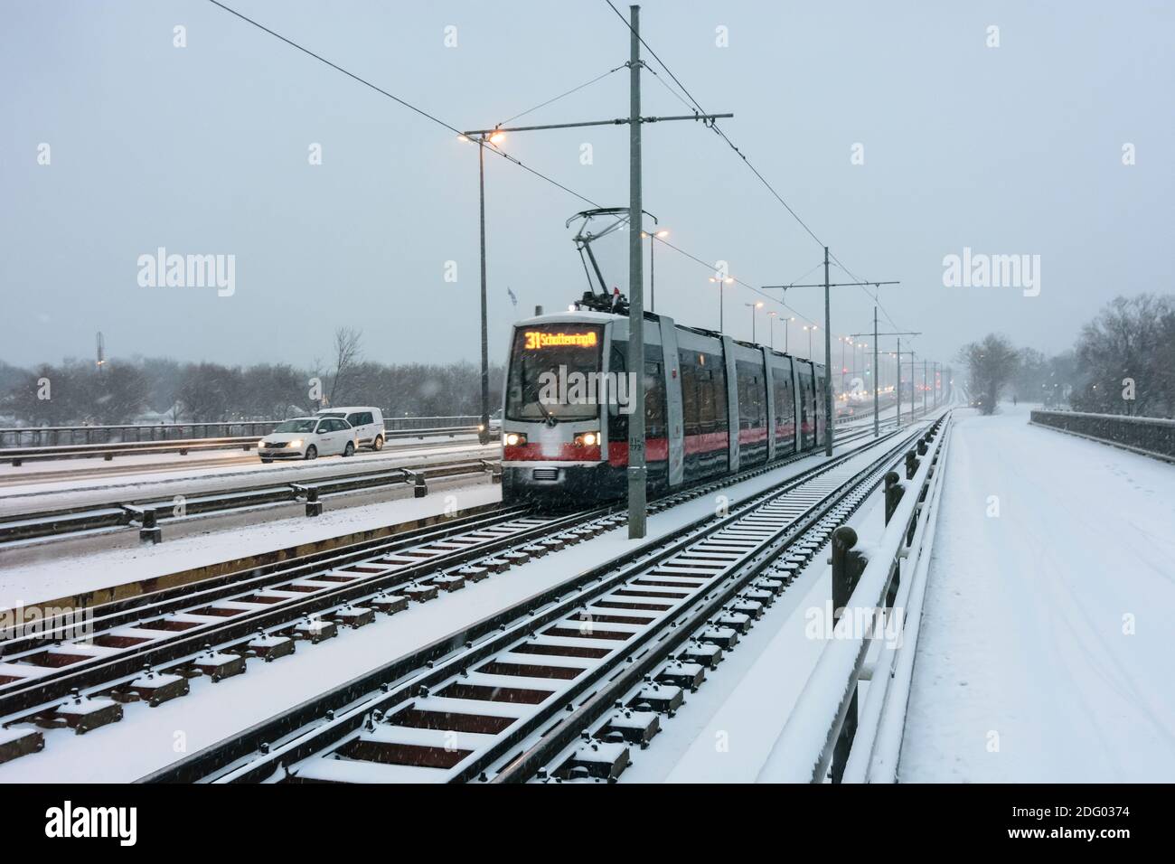 Wien, Vienna: bridge Floridsdorfer Brücke, snowfall, streetcar in 20 ...
