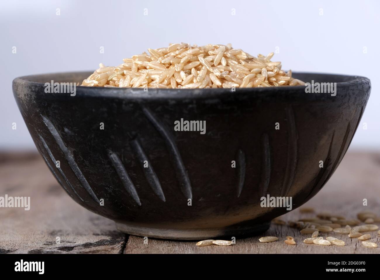 Raw brown rice hi-res stock photography and images - Alamy