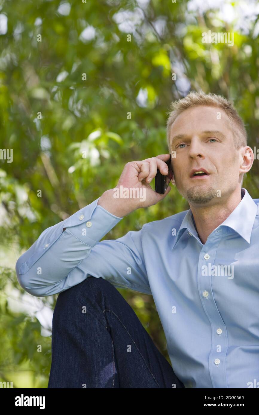 Outdoor phone call Stock Photo - Alamy