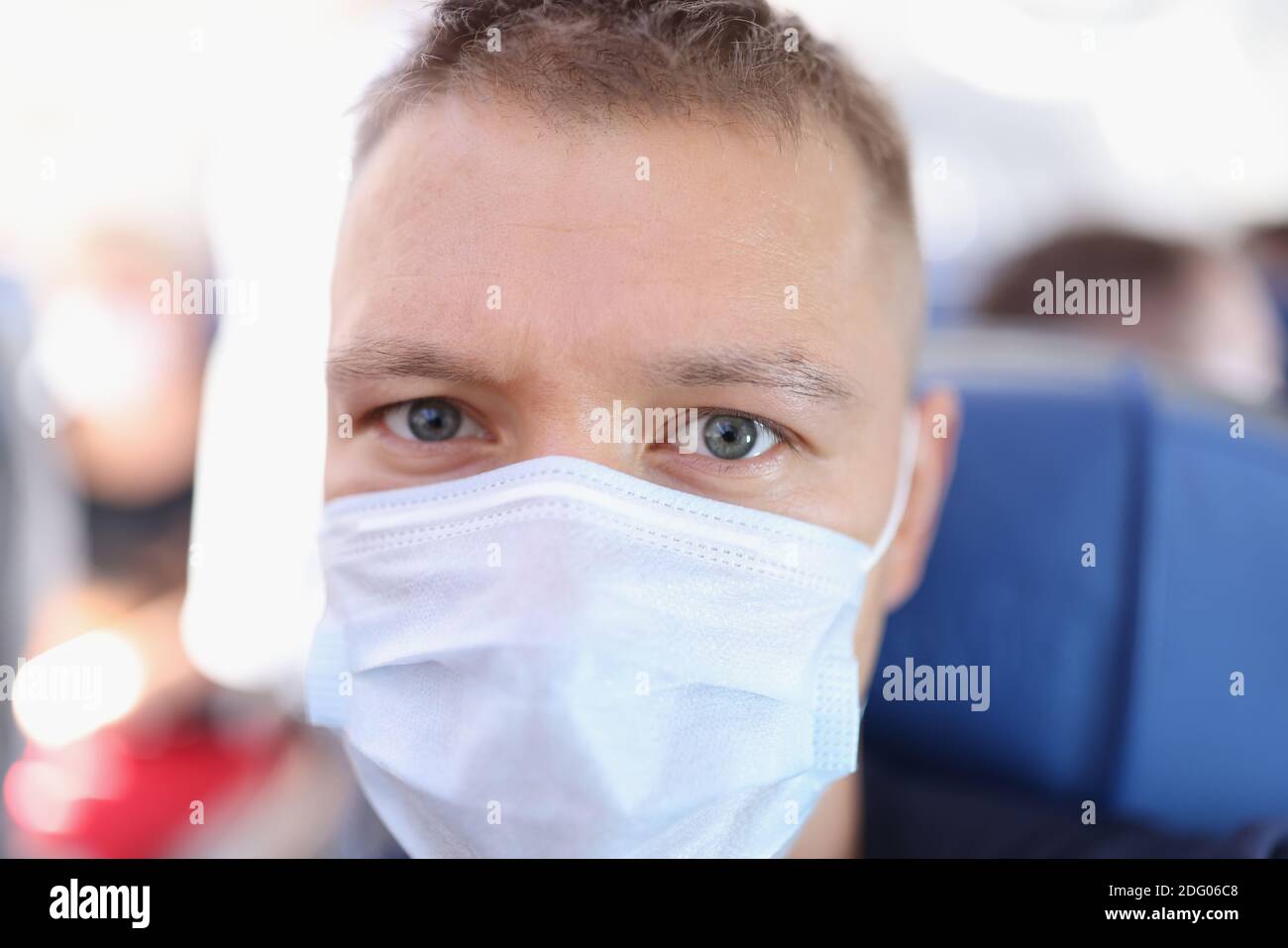 Passenger in protective mask sit in cabin Stock Photo - Alamy