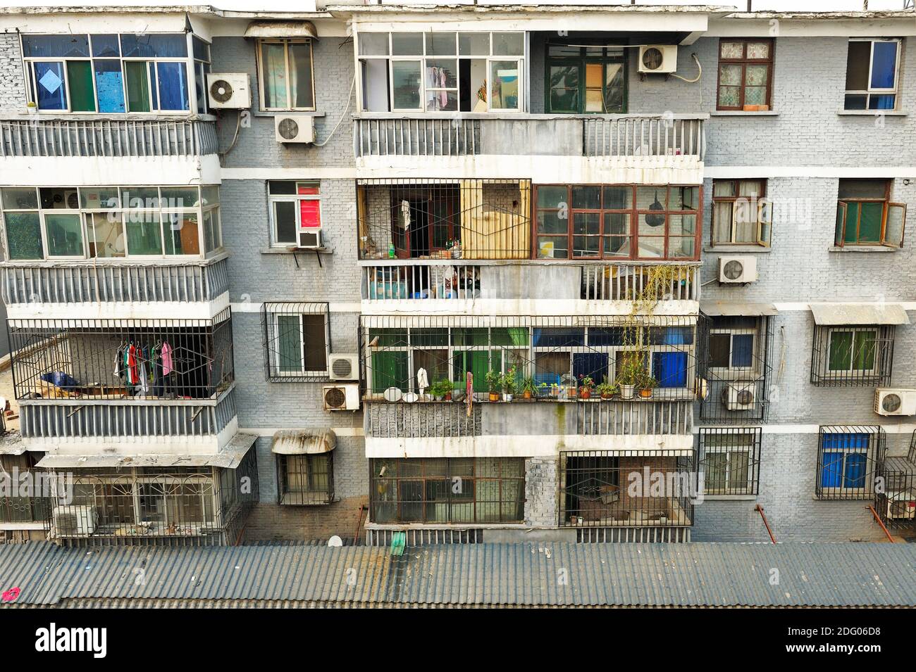 Facade of overcrowded habitation building in Xian, one of Chinese ...