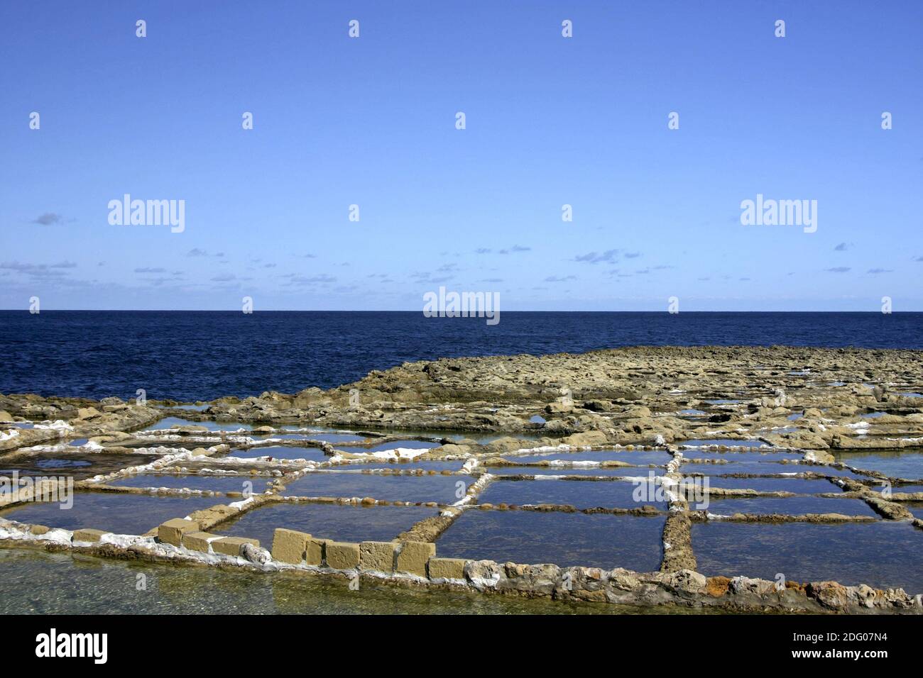 Salt pans on the island of Gozo Stock Photo - Alamy