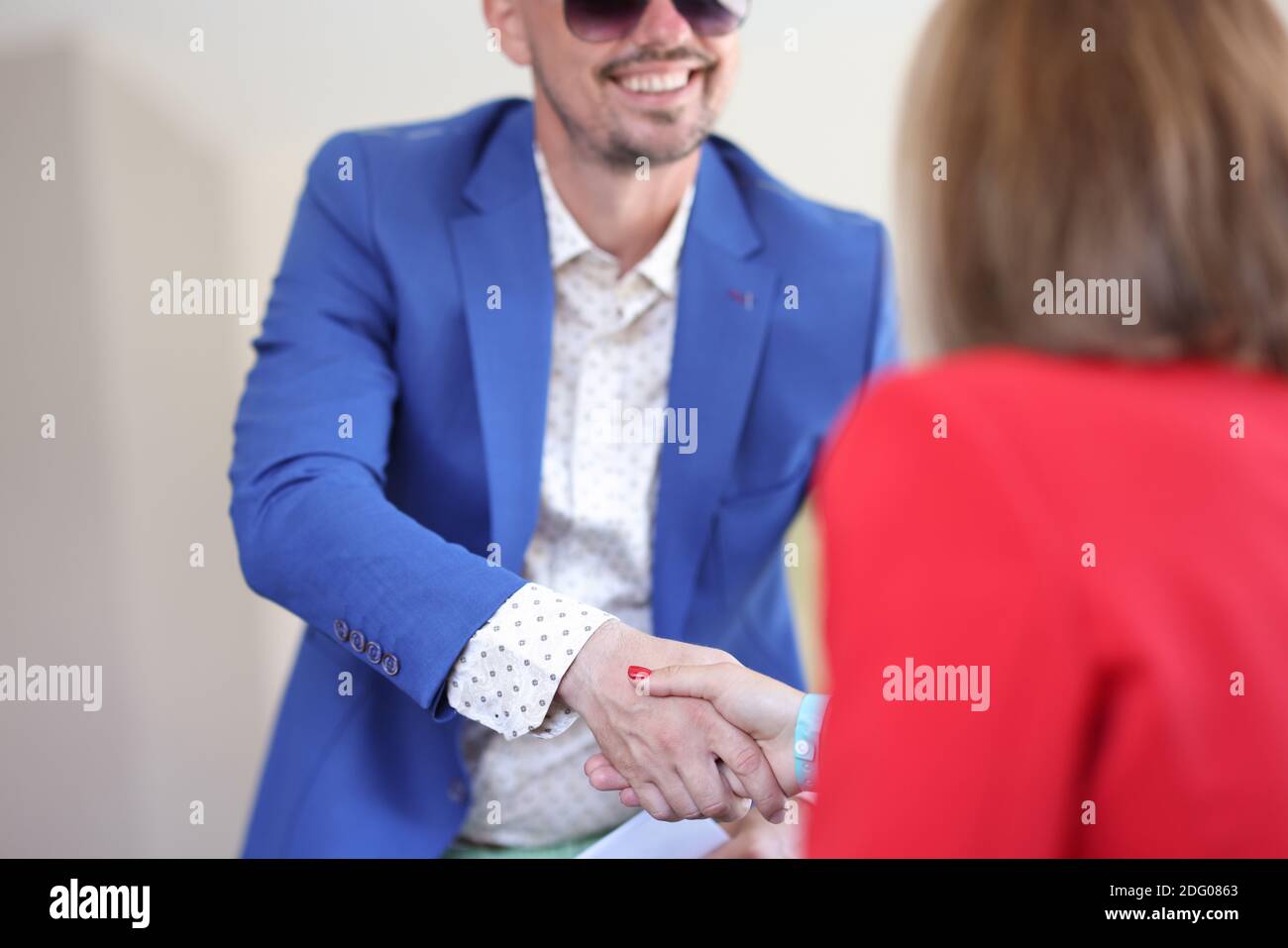 Handshake of partners during professional meeting at work Stock Photo ...