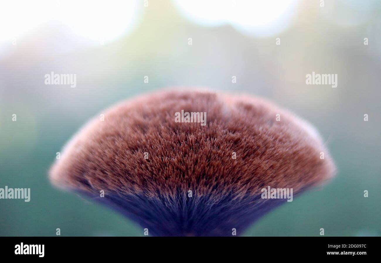 Side view of pink make up brush with soft blurred background - copy ...