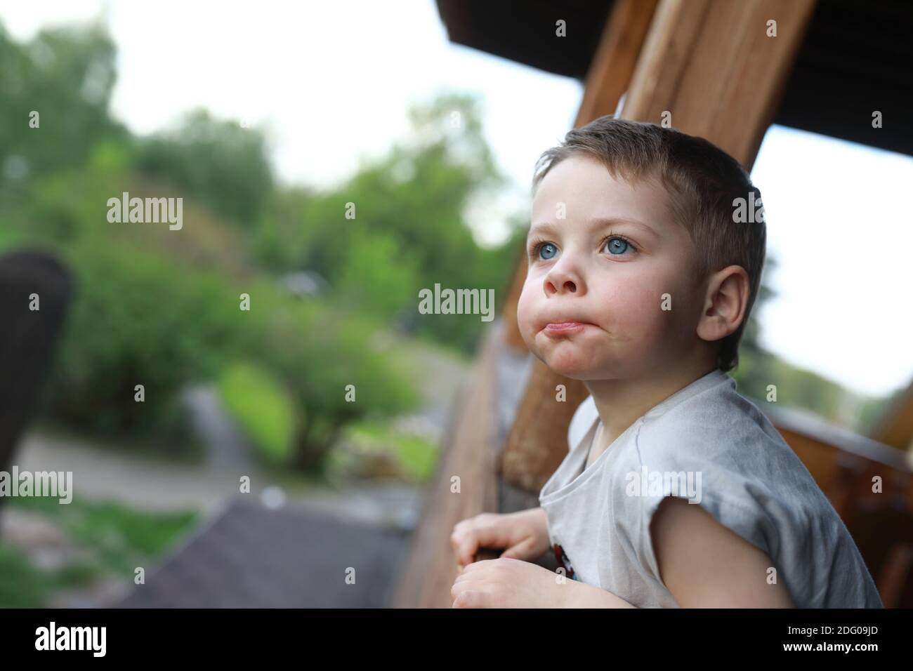 Adorable child thinking in hi-res stock photography and images - Alamy