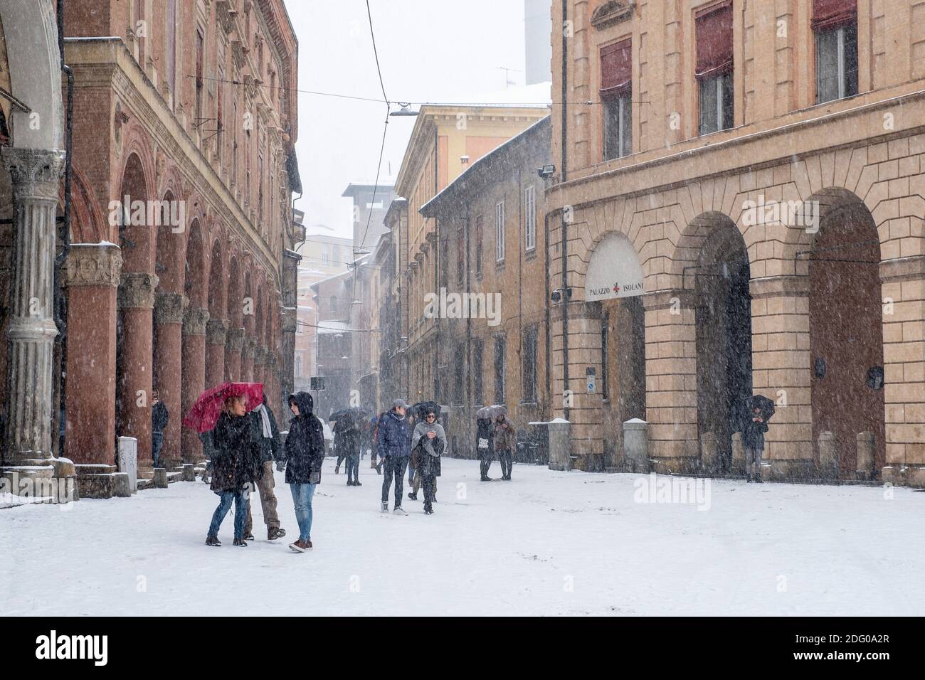 Snow falling in the Piazza di Santo Stefano, Bologna, Italy Stock Photo ...