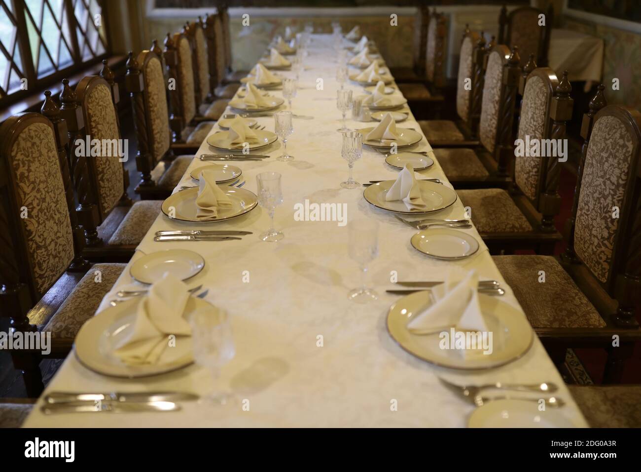 View of served dining table in restaurant Stock Photo - Alamy