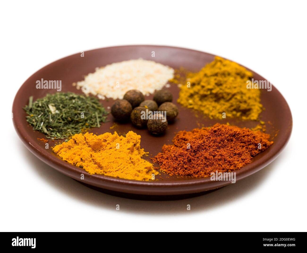 Many different spices in plate Stock Photo - Alamy