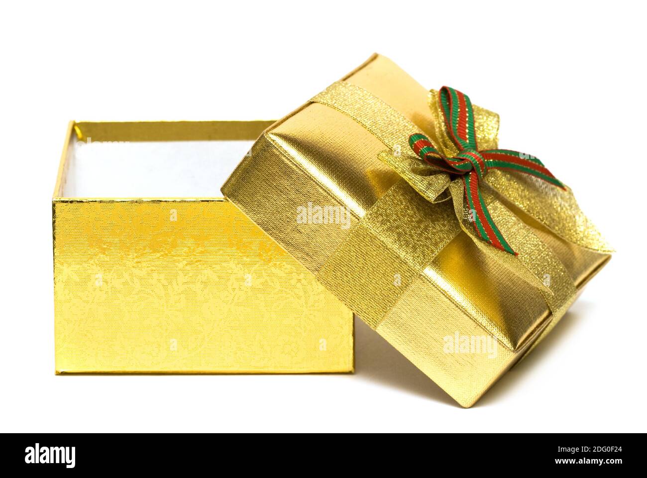 Gift box with golden bow Stock Photo - Alamy