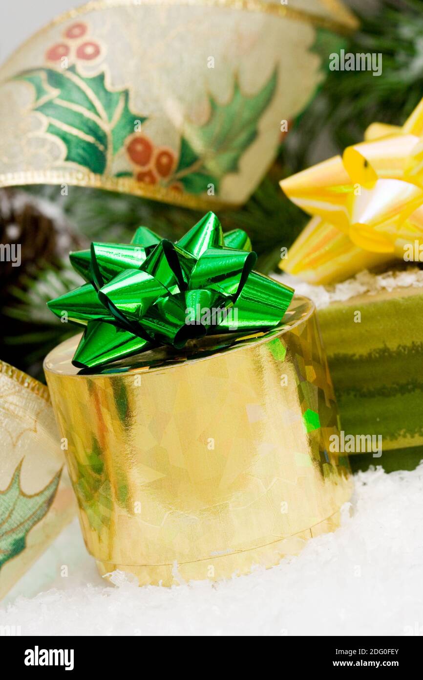 Gift box with Christmas tree on snow Stock Photo - Alamy