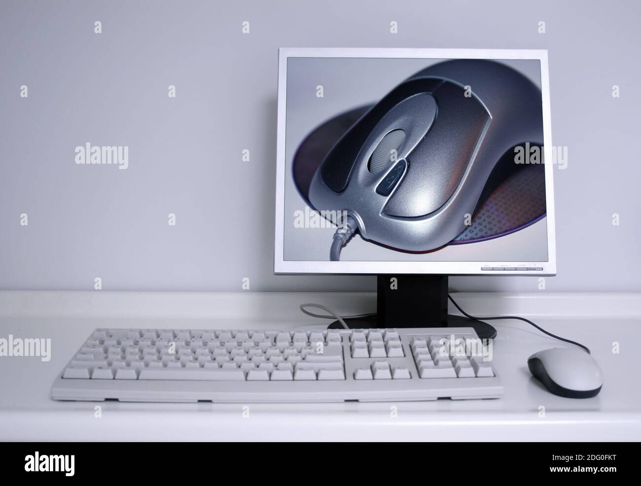 PC with mouse on desktop Stock Photo - Alamy