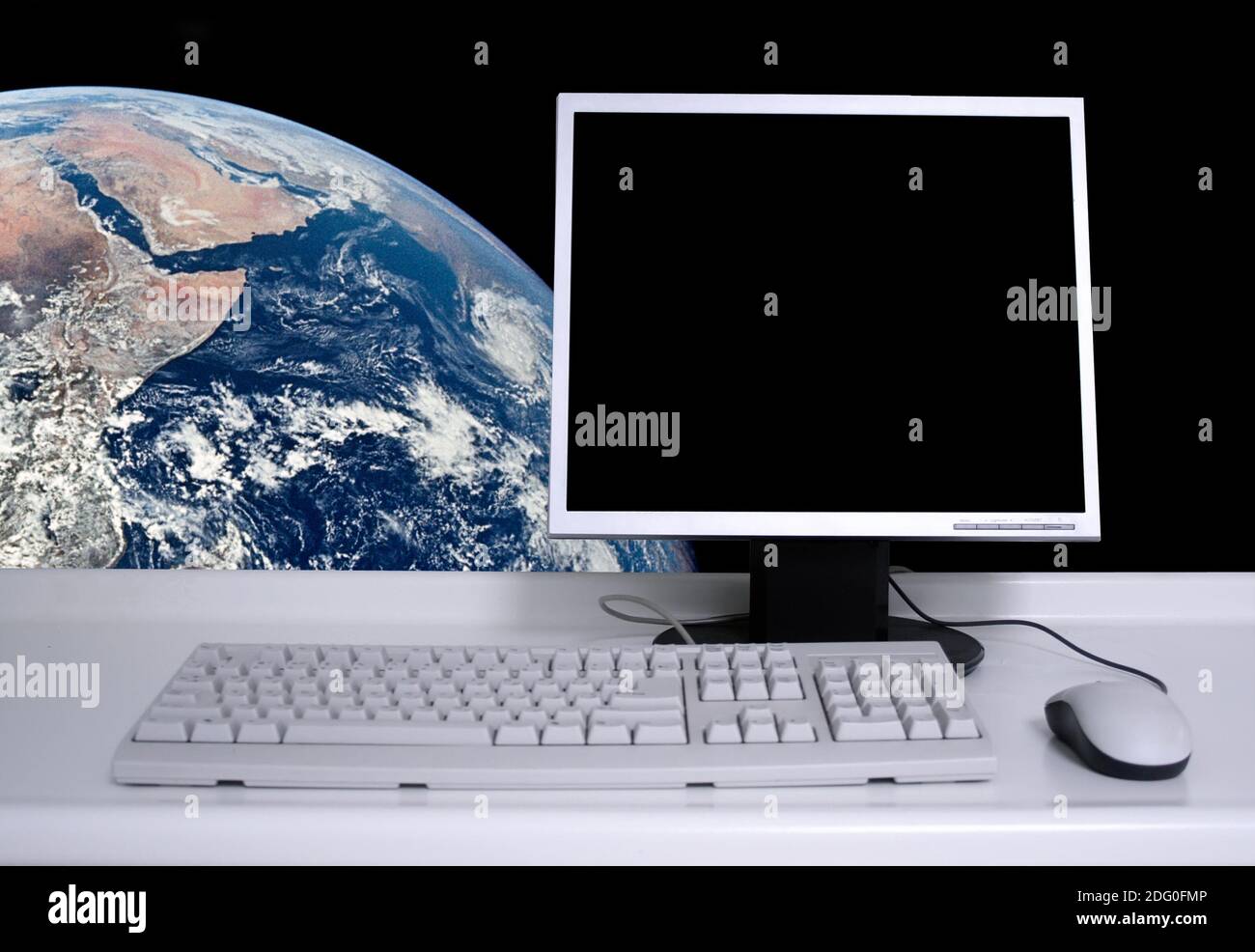 PC with earth background Stock Photo - Alamy