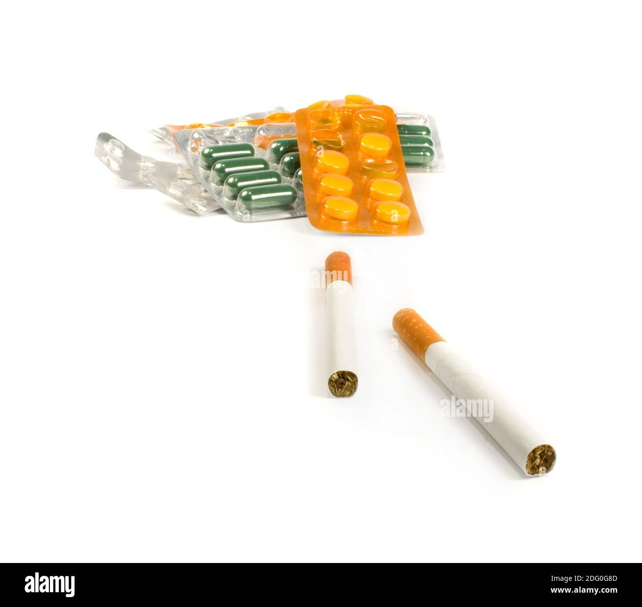 Cigarettes and pills isolated.Illnesses from cigar Stock Photo - Alamy