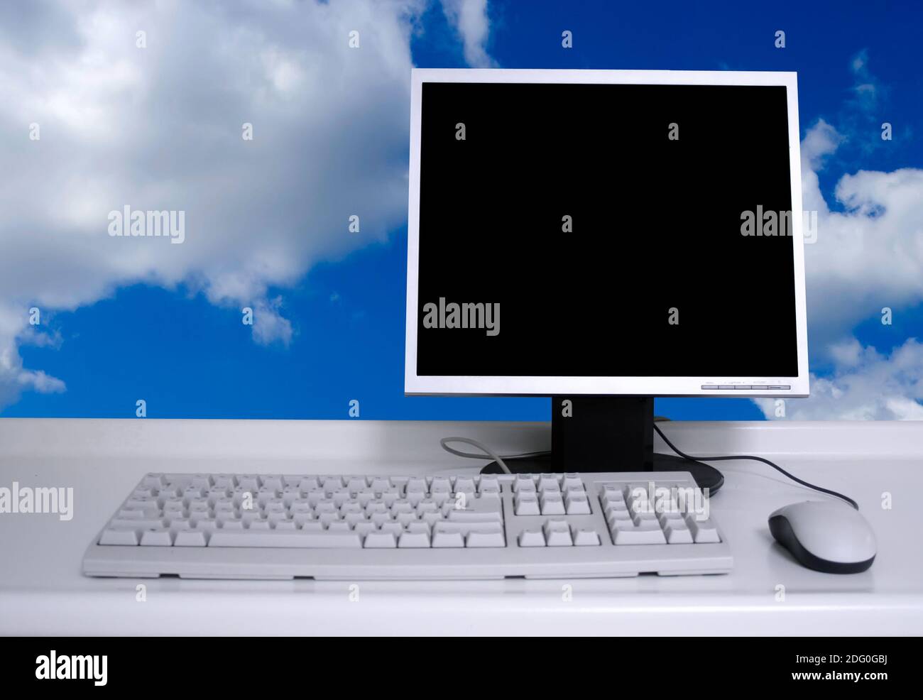 PC with clouds background Stock Photo - Alamy