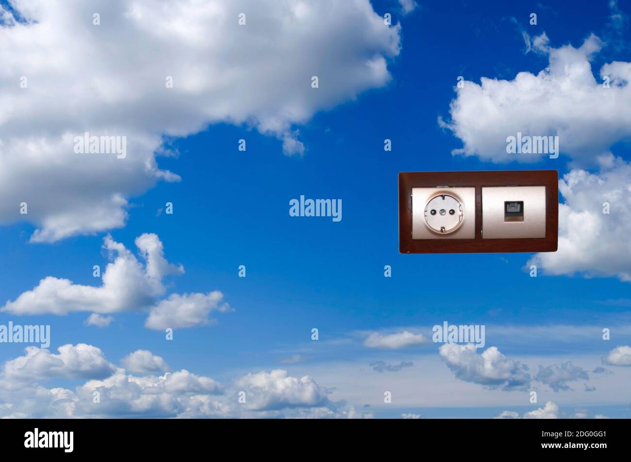 Energy outlet with blue sky background Stock Photo - Alamy