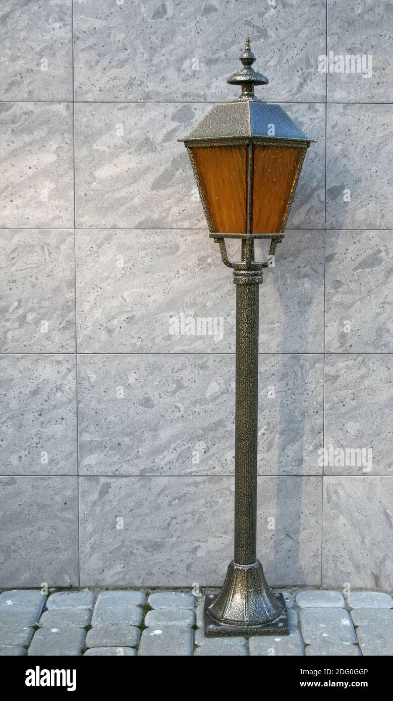 Old classical lantern standing on the ground Stock Photo - Alamy