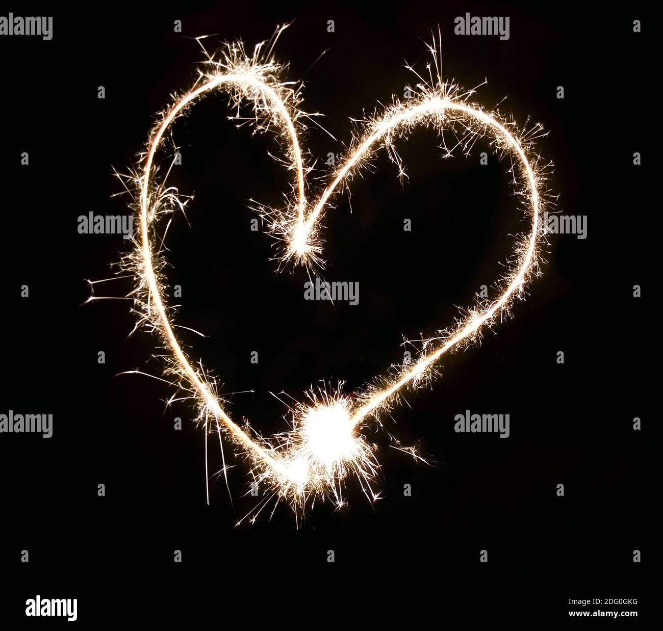 Sparkler heart isolated Stock Photo - Alamy