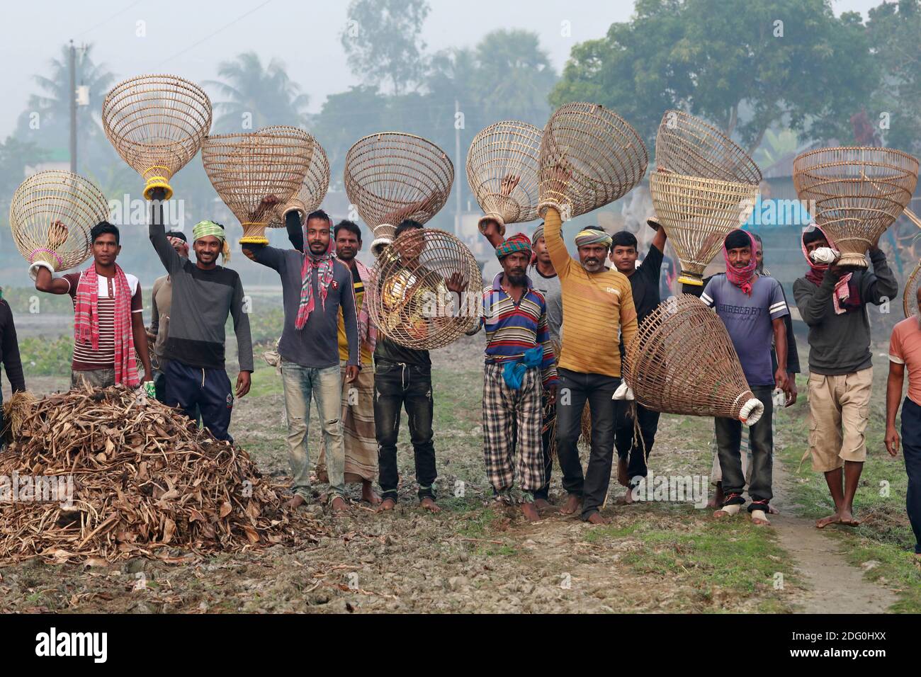 Pabna, Bangladesh - December 05, 2020: People line up in groups to ...