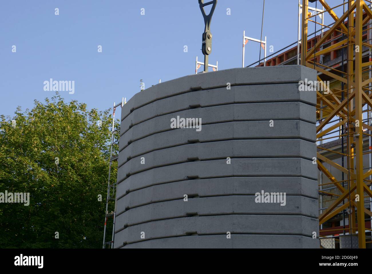 construction site with heavy cement blocks are used as counterweights ...