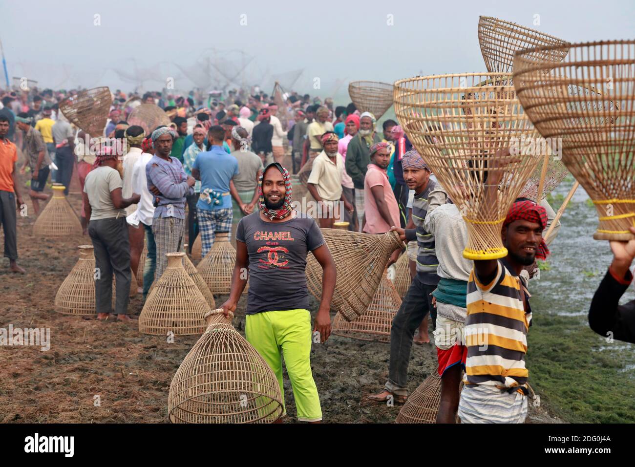 Pabna, Bangladesh - December 05, 2020: People line up in groups to ...