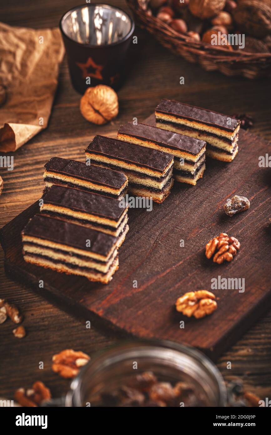 Gerbeaud cake, a crispy pastry with walnut, apricot jam and a shining ...