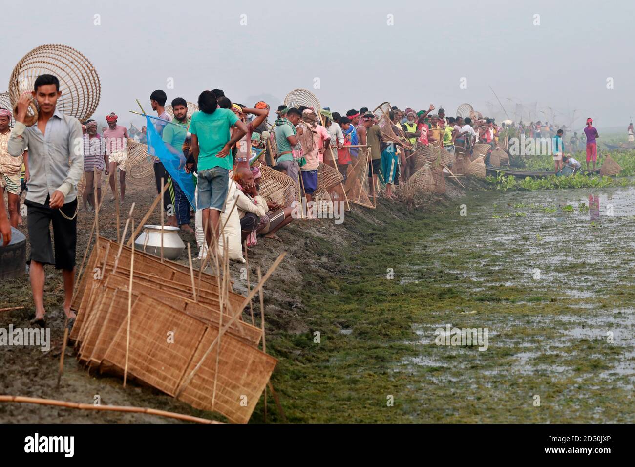 Pabna, Bangladesh - December 05, 2020: People line up in groups to ...