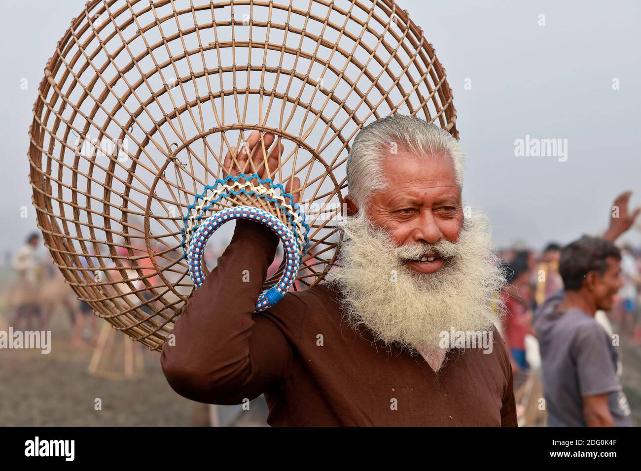 Pabna, Bangladesh - December 05, 2020: People line up in groups to ...