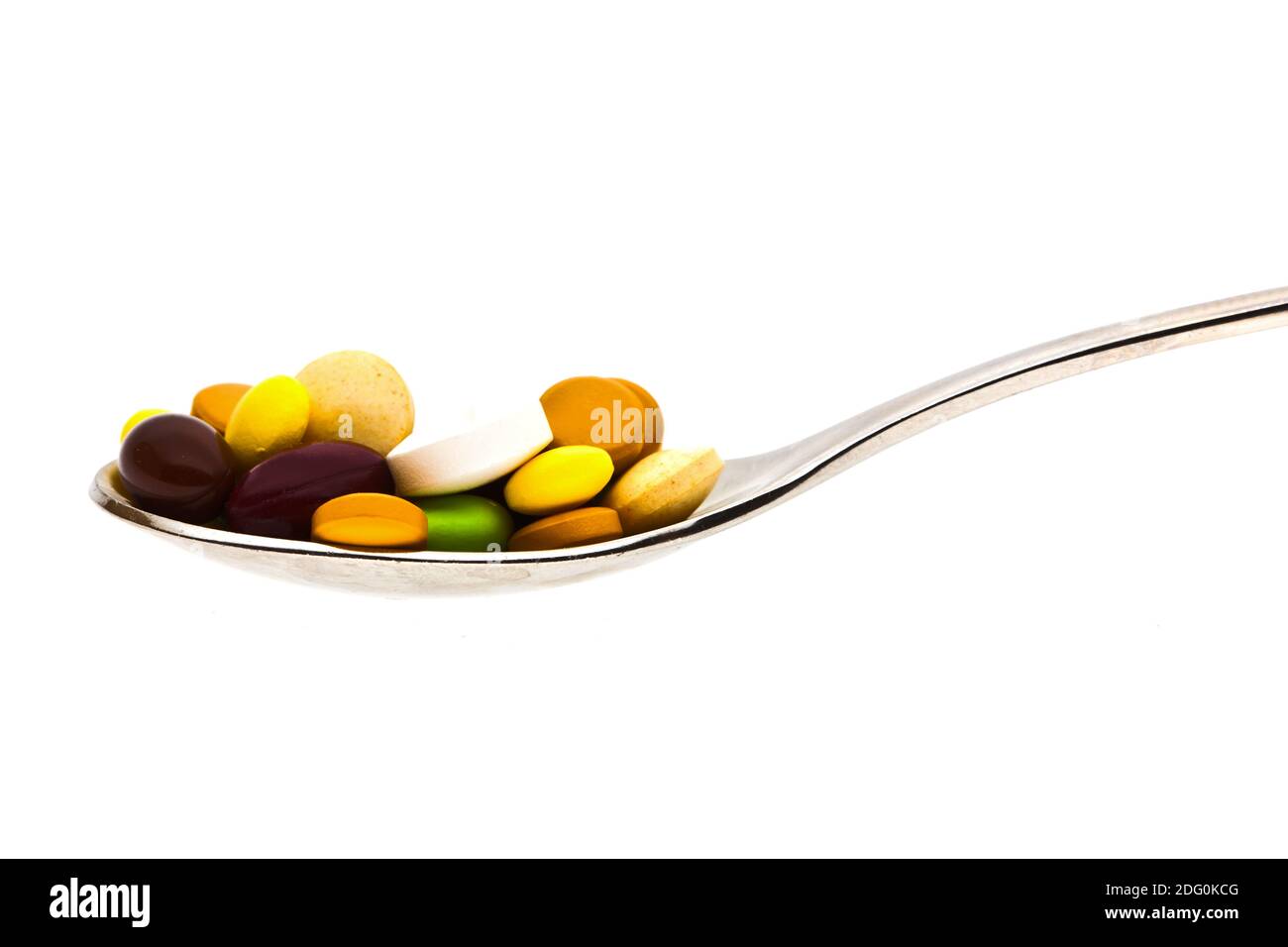 Spoons of medicine Stock Photo - Alamy