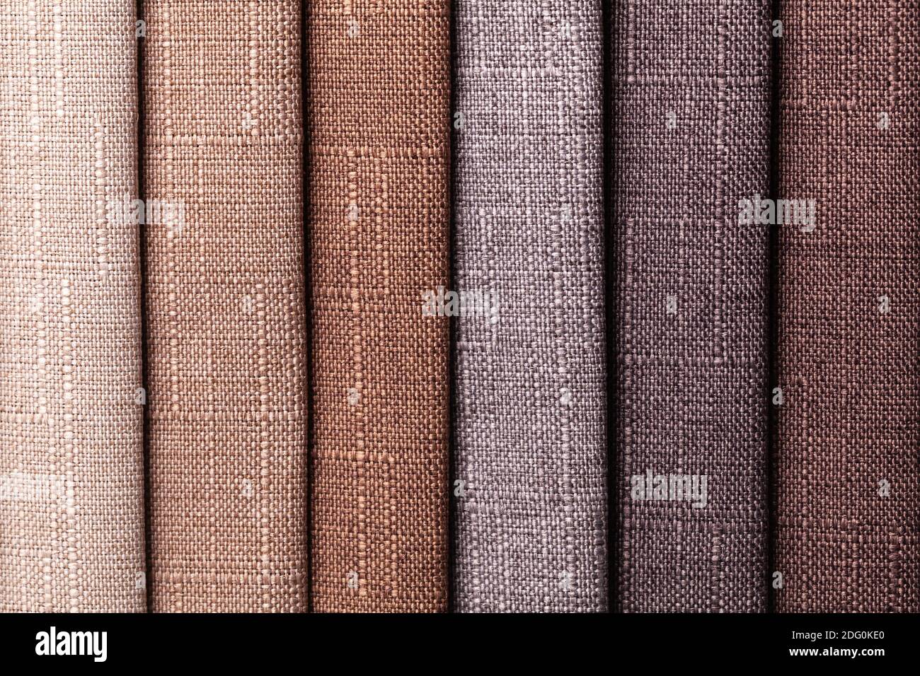 Swatch of woven textile brown and gray colors, background. Catalog and ...