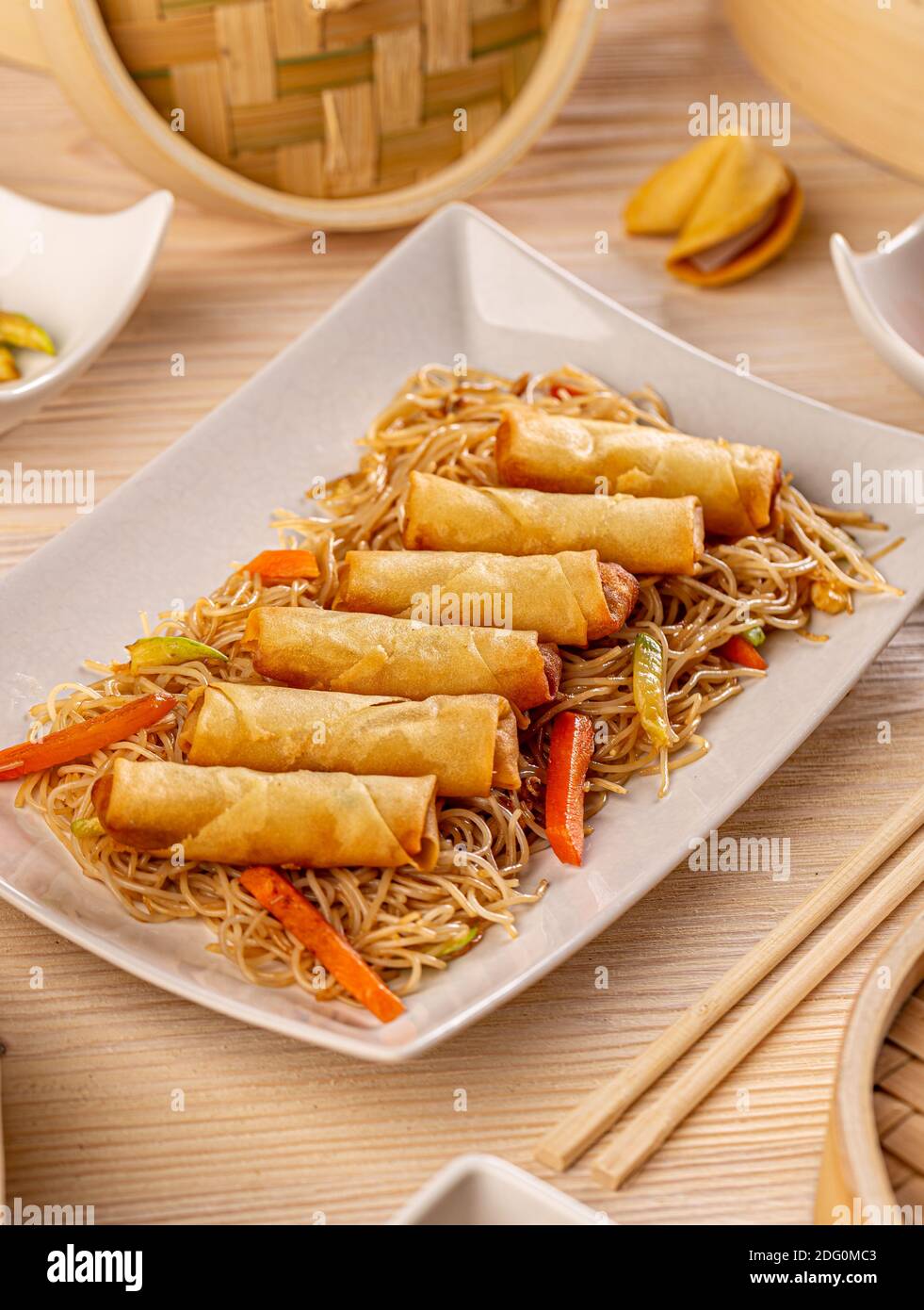 Vegetable fried spring rolls served with noodle, Traditional Chinese ...