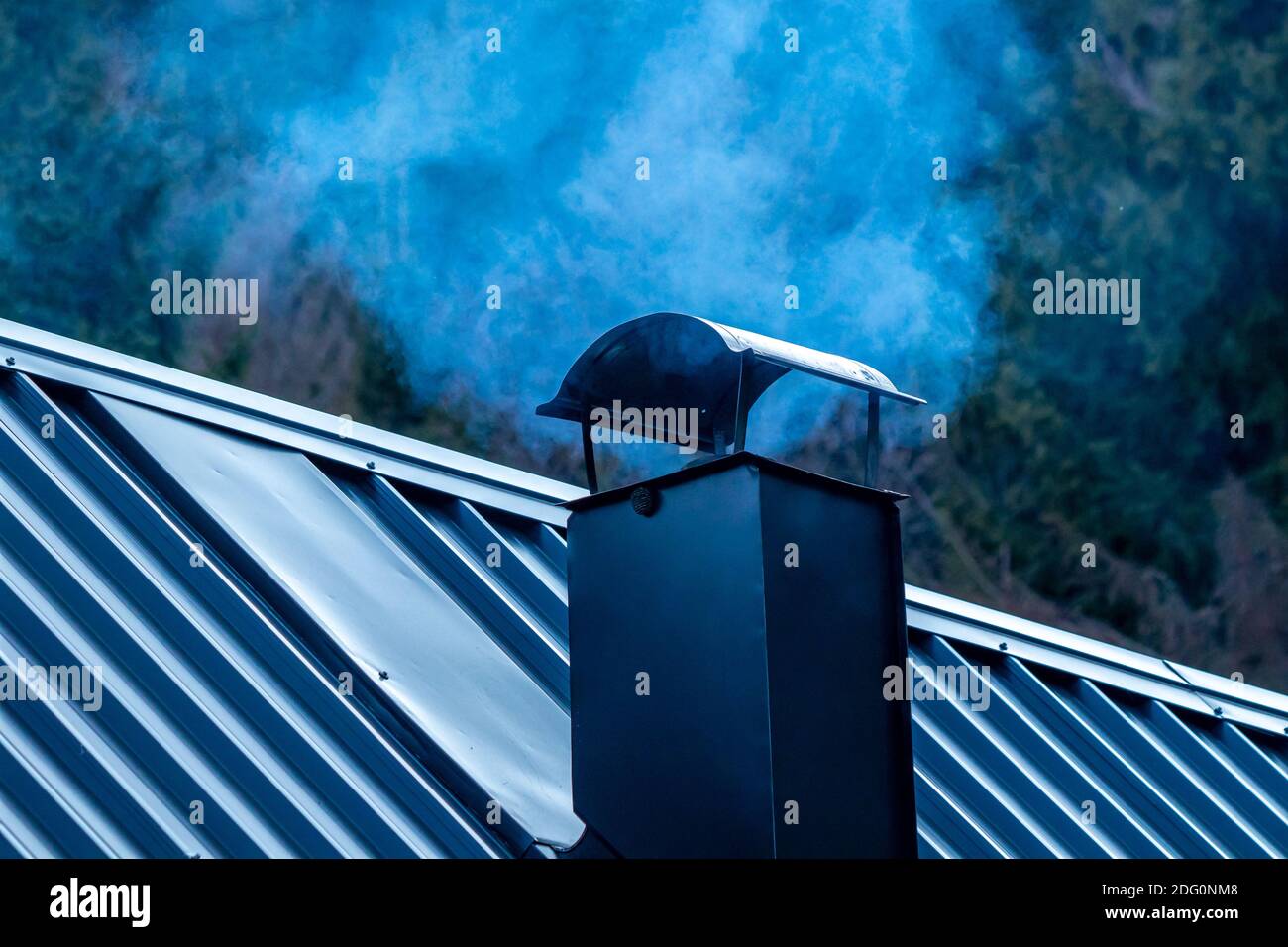 Metal chimney on the rooftop Stock Photo - Alamy
