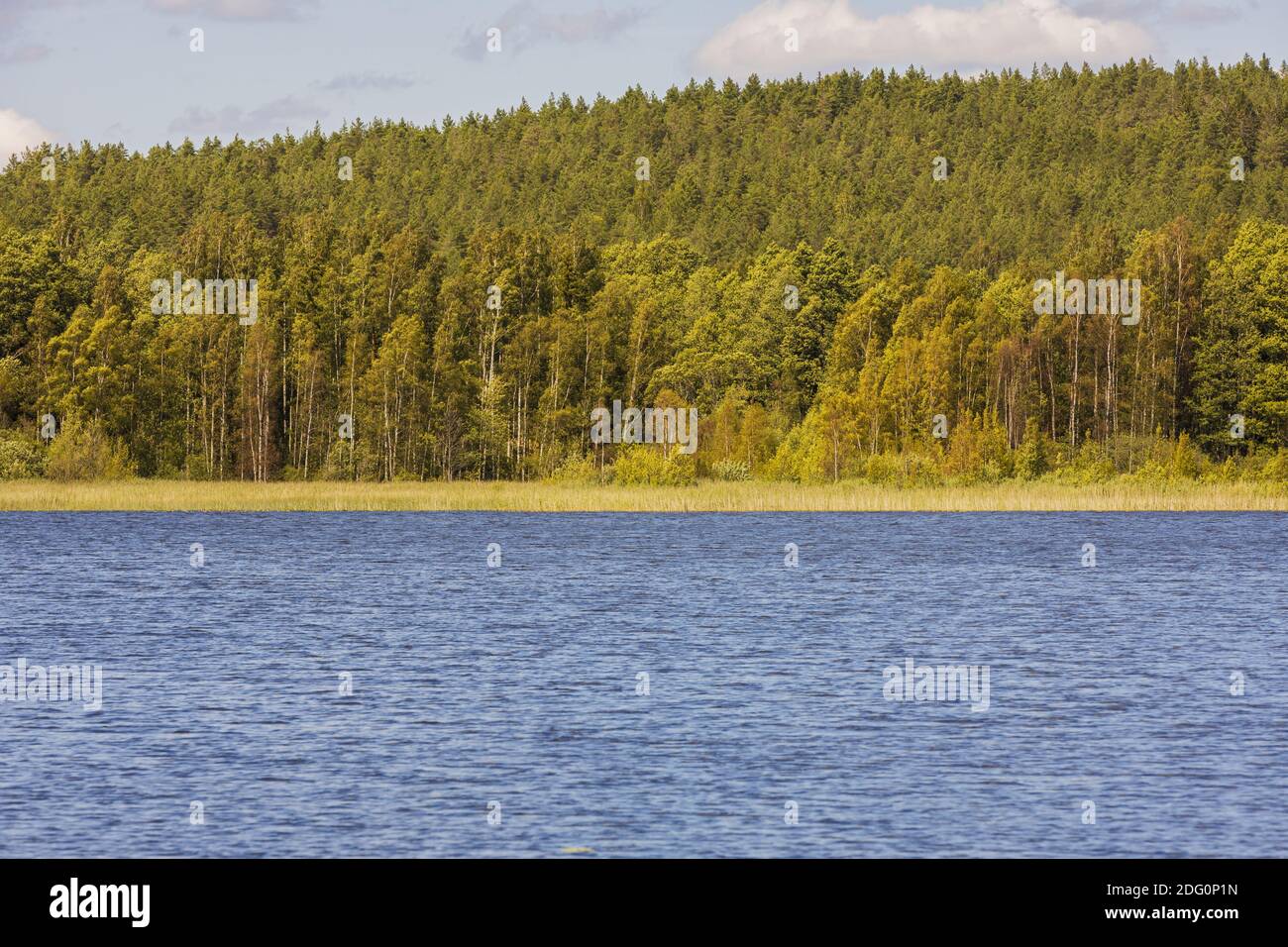 Beautiful lake view on blue sky with white clouds background. Beautiful ...